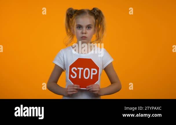 Preteen girl showing stop sign, family misbehavior, children rights ...