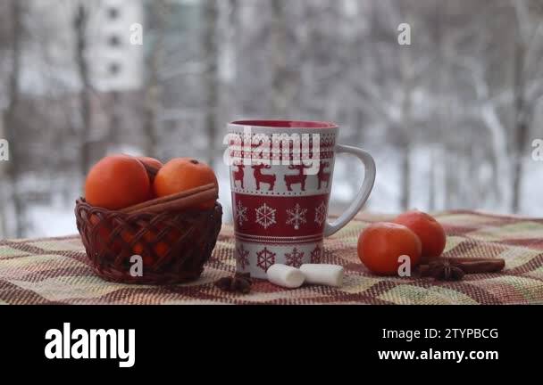 Pouring boiling water into the cup from the kettle in the winter. Video ... Pouring boiling water into the cup from the kettle in the winter. Video ...