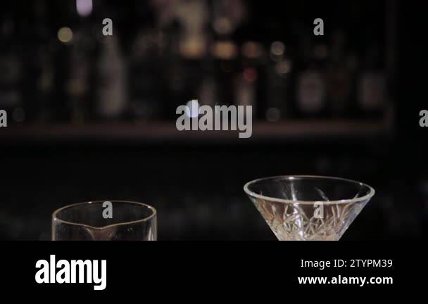 Cocktail shaker and beaker for preparation beverages on bar counter in ...