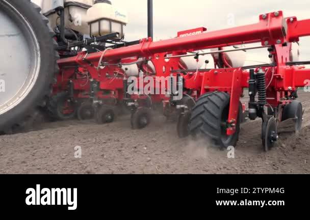 close-up, tractor with special precision planters, seeder is working in ...
