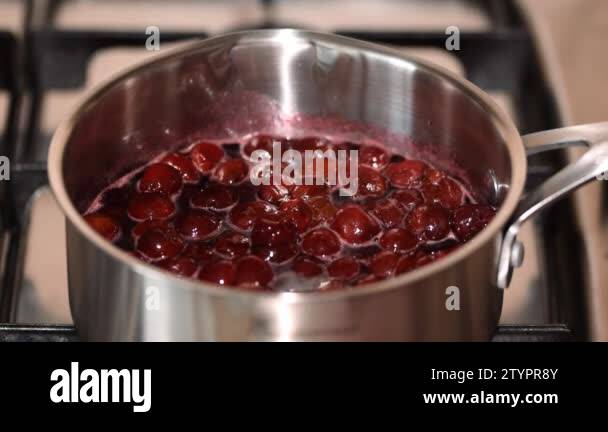 Cherry in syrup, boiled cherry. Boiling cherry syrup. Preparation of ...