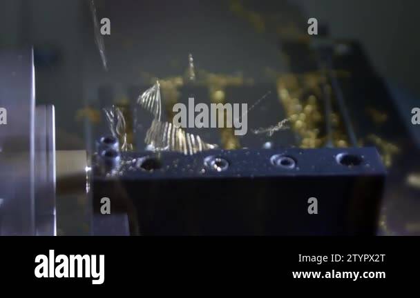 Metalworking milling machine. Produces fine gold detail in a factory ...