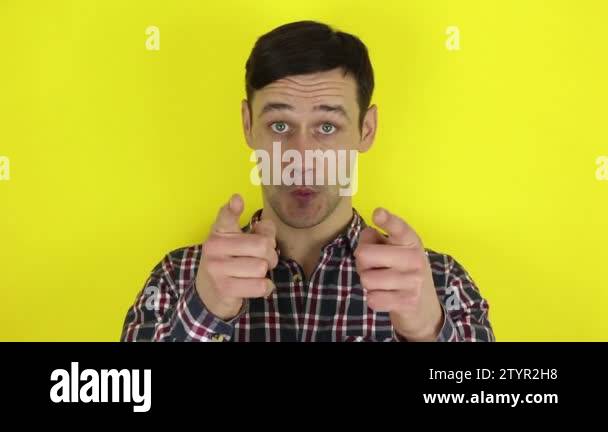 A funny, cute guy asks for a callback and makes a hand gesture ...