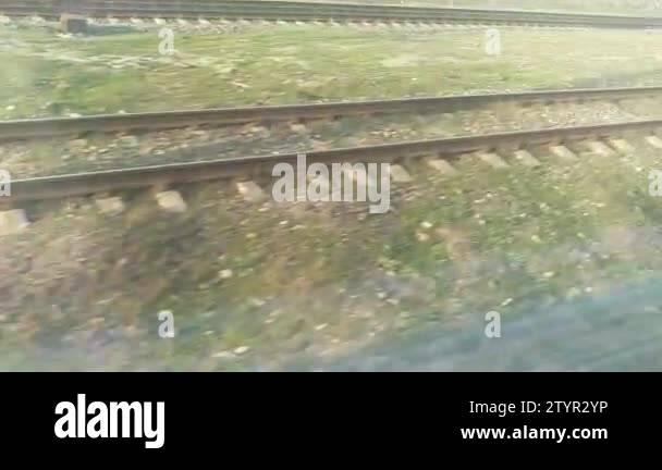 Railway liner close-up from a window of a passenger train. Railway ...