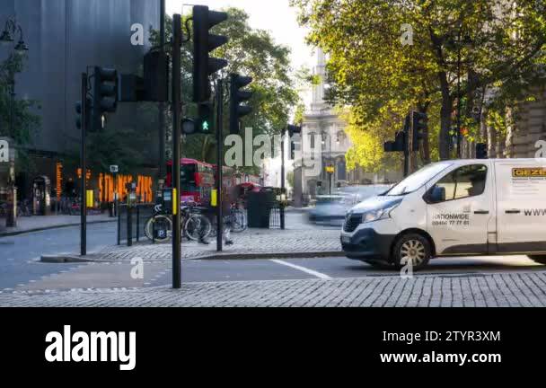 Crosswalk and traffic lights on the Strand street, St Mary le Strand ...
