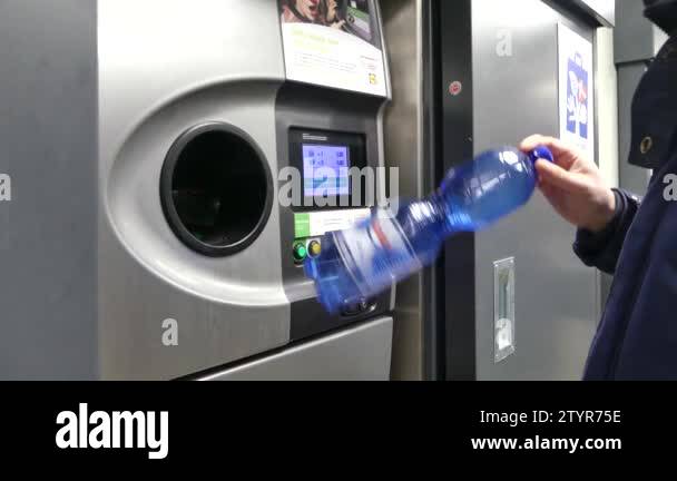COPENHAGEN, DENMARK - MARCH 2019: A man puts empty booths in an ...