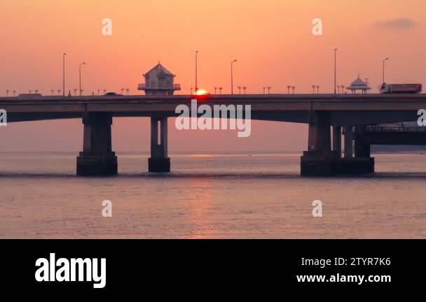 beautiful sky during sunset going down to the sea behind Sarasin bridge ...