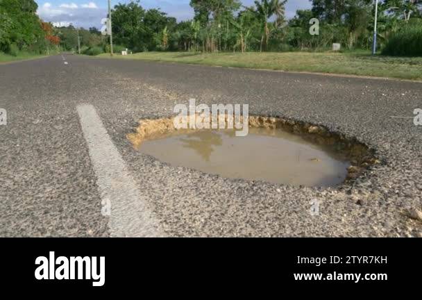 Hole in road pothole hole Stock Videos & Footage - HD and 4K Video ...