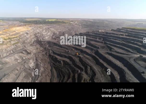 Panorama aerial view shot open pit mine coal mining, dumpers, quarrying ...