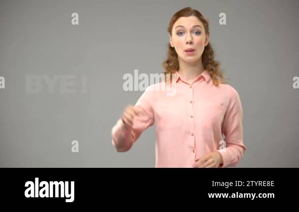 Female saying bye in sign language, text on background, communication ...
