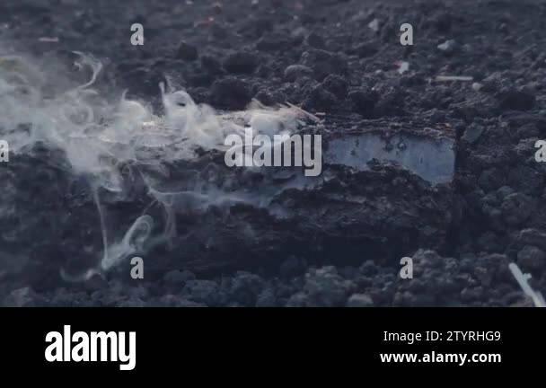 Explosion on the surface of the earth from an explosive device, hit by ...