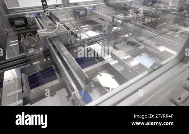 Factory produce solar cells panels. Sun battery conveyor line. Handheld ...