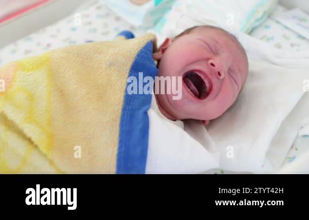 Newborn baby crying Stock Video Footage - Alamy