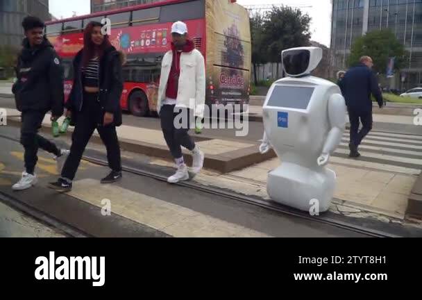 Milan, Italy - March 5, 2020: a robot walks through the city streets ...