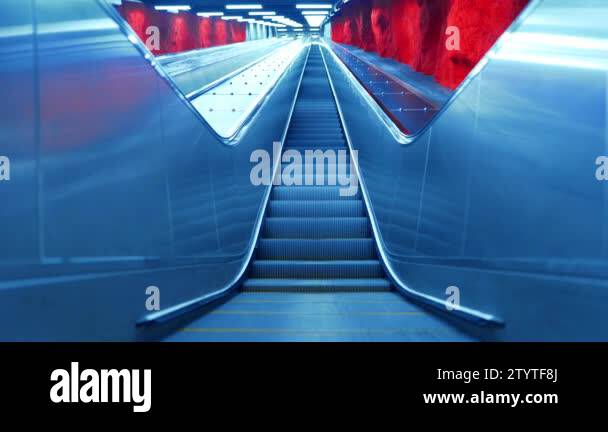 Pedestrian crossing escalator goes endlessly without people. Automatic ...