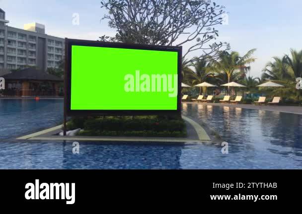 Modern greenscreen led tv at waterfront of empty summertime resort ...