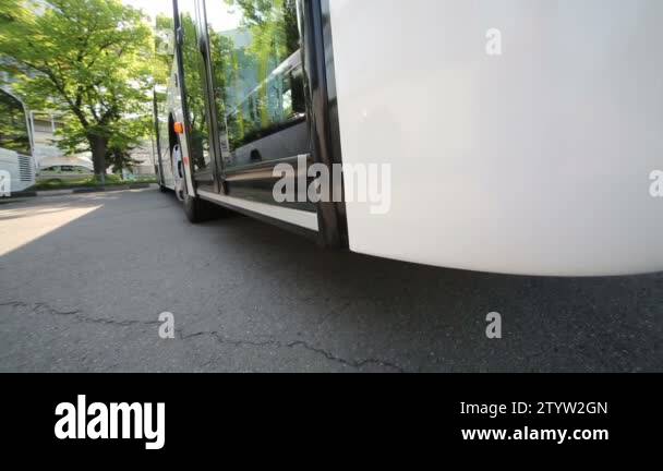 Driver opens doors and exit bus Stock Video Footage - Alamy