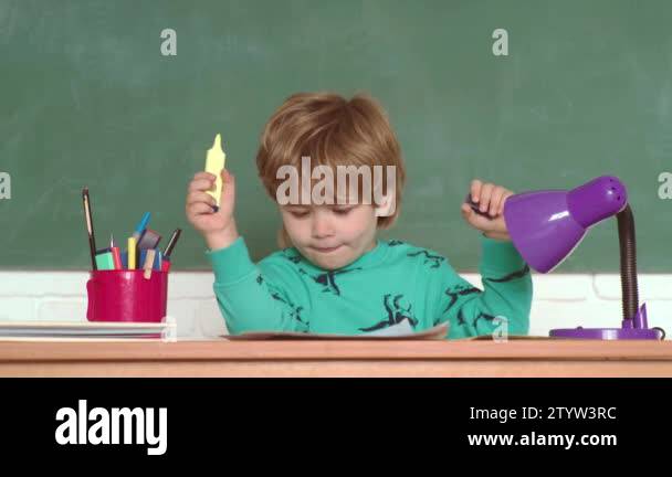 Little boy in classroom. School lessons. Cute little preschool kid boy ...