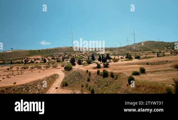 Flying around large wind turbines at ecology power plant on Cyprus ...