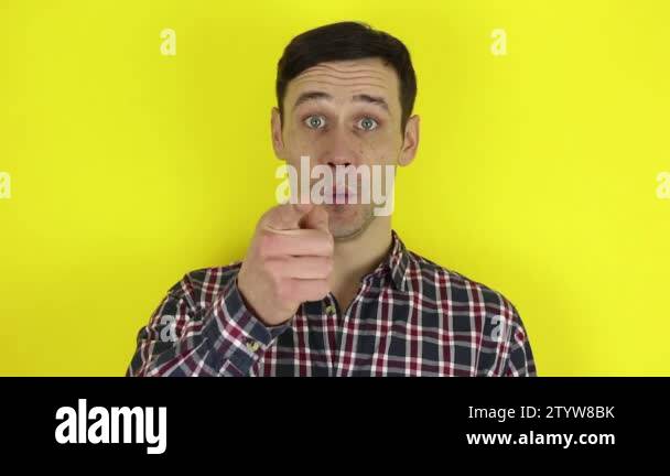 A funny, cute guy asks for a callback and makes a hand gesture ...