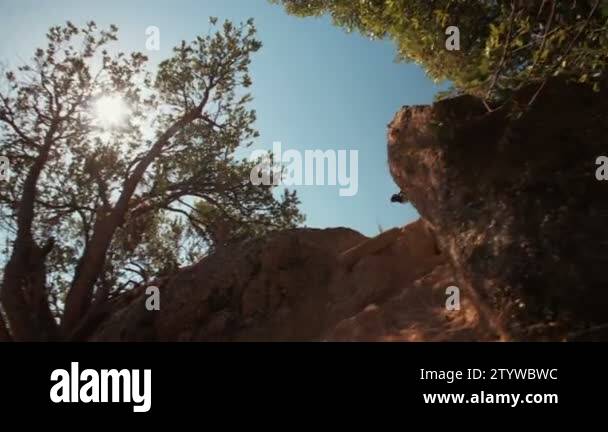 Mountain biker riding over rocks Stock Videos & Footage - HD and 4K ...