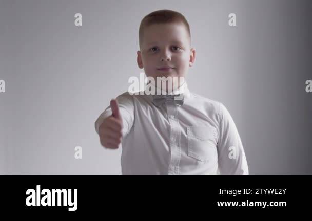 Cheerful Boy Smiling And Showing Like And Dislike Stock Video Footage ...