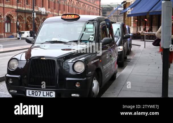 LONDON - MARCH 19, 2020: CLOSE UP shot of a black London taxi cab ...