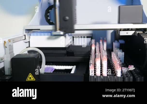 Laboratory analysis and diagnostic machine. Robotic manipulator arms ...