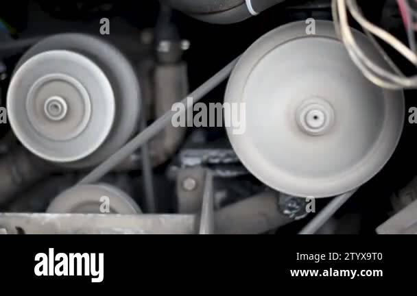 The engine of the car, in a running car, the movement of the belt ...