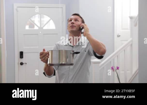 Man Calling Emergency Plumber After Water Leak At Home. Upset Man ...