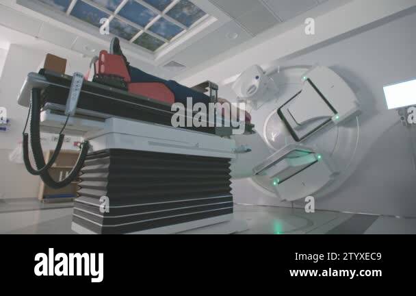 Patient Getting Radiation Therapy Treatment Inside A Modern ...