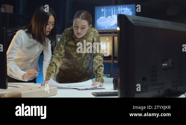 Asian young woman, military office worker, and Caucasian female soldier ...