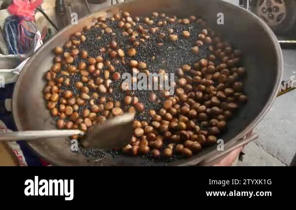 Pan frying chestnuts Stock Videos & Footage - HD and 4K Video Clips - Alamy