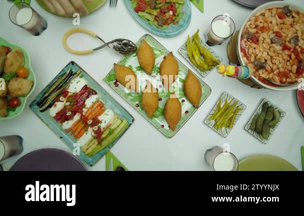 Top view of a traditional delicious Turkish family dinner table ...