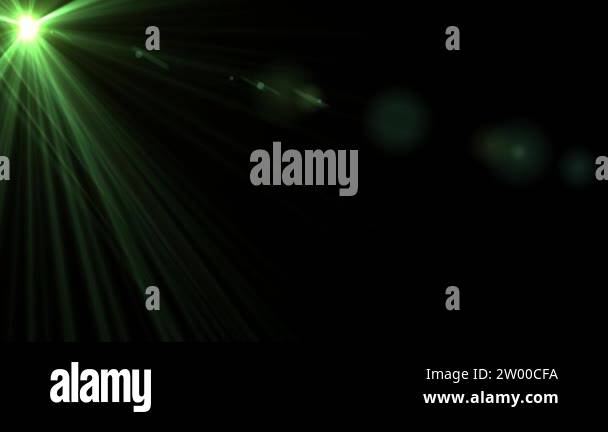 Rotating flickering lens flare effect on black background. 4k animation ...