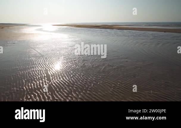 Ribbed sand - Baltic sea gulf beach with white sand in the sunset - 4K ...