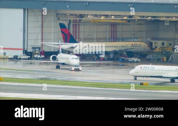 Delta Airlines Hangar with a Parked Commercial Passenger Airplane and ...