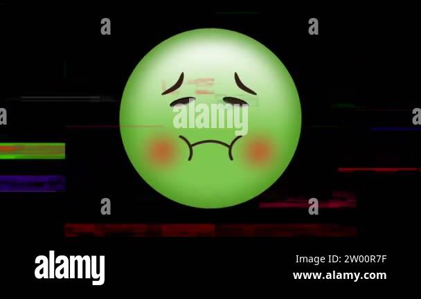 Digital animation of a green face with sad eyes and red cheeks, as if ...