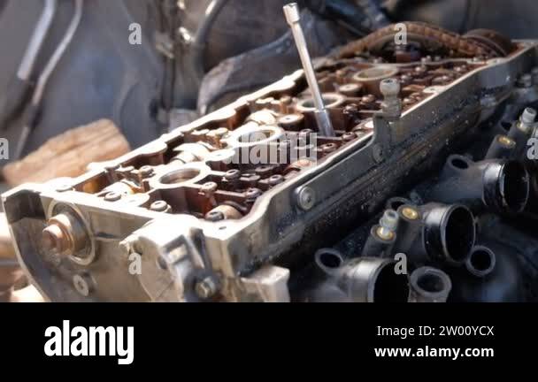 Dynamic video of car engine in auto service. Vehicle inspection or ...
