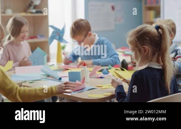 Elementary School Arts & Crafts Class: Diverse Group of Smart Children ...