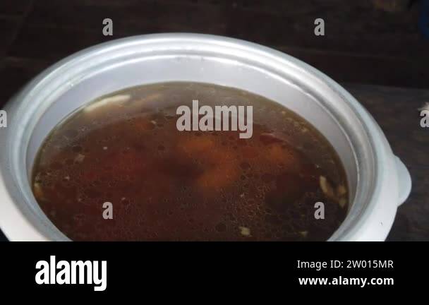 Traditional silver steamer pot with white smoke while cooking Stock ...