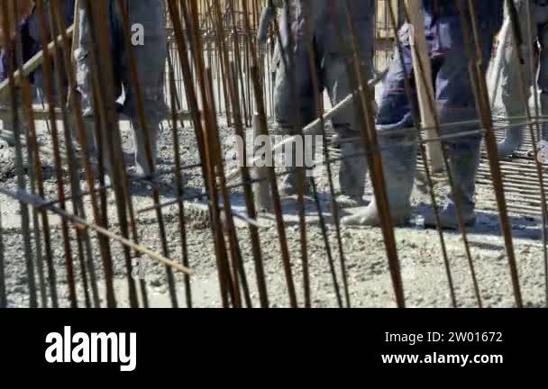 Concreting Work by Construction Workers at the Construction Site ...
