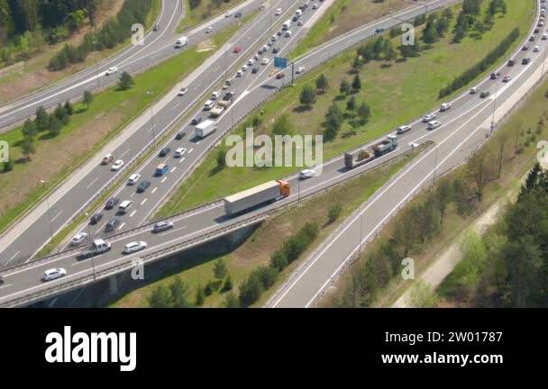 DRONE: Flying along a cargo truck following a lorry carrying heavy ...
