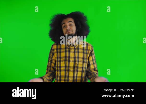 Portrait of helpless african american man throwing hands aside and ...