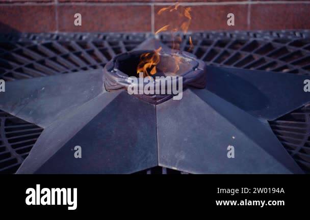 Eternal Flame memorial monument with star at Tomb of Unknown Soldier ...