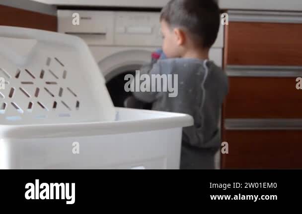 Boy washing machine Stock Videos & Footage - HD and 4K Video Clips - Alamy