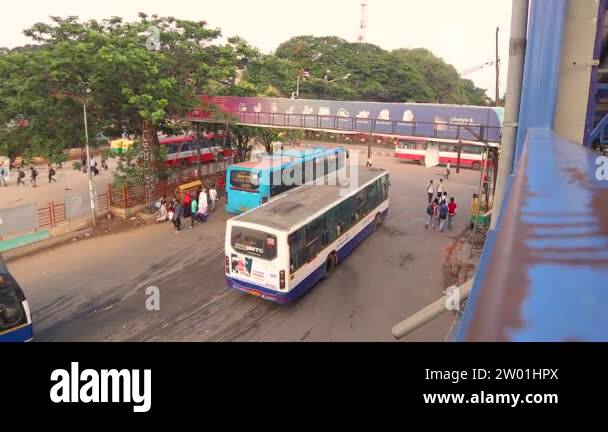 Aerial View of urban Public bus station, Buses moving out from the bus ...