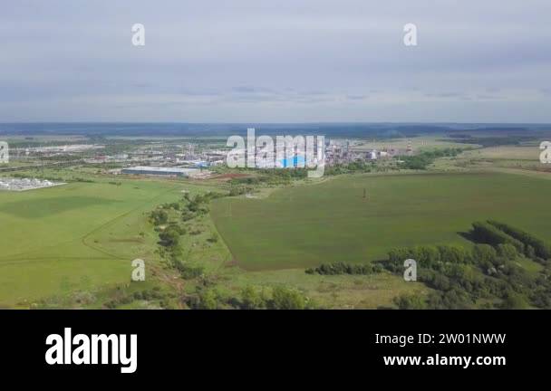 Breathtaking aerial view of the industrial area with factory surrounded ...