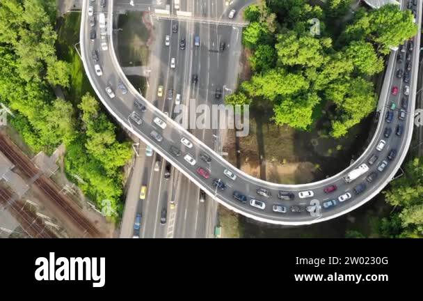 cars move slowly on upper loop of multi-level interchange Stock Video ...