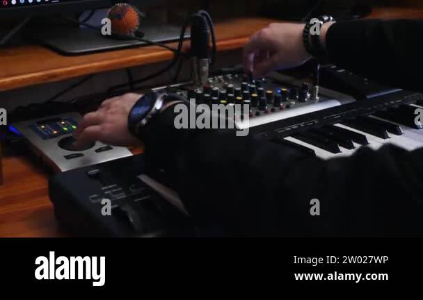 Sound engineer work station with soundboard midi piano and sound ...